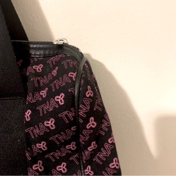 TNA | Bags | Aritzia Tna Small Duffle Black With Pink Tna Logo Satchel ...